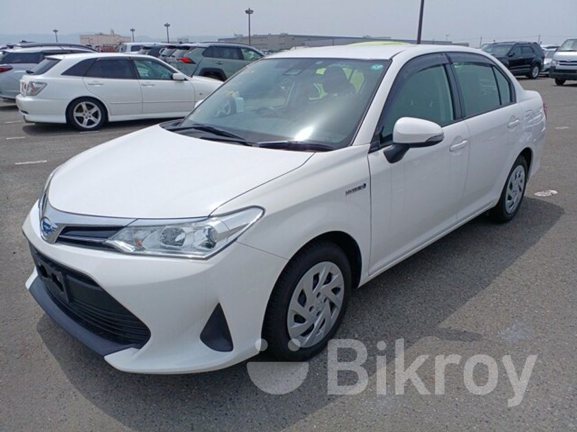 Toyota Axio EX PKG HYBRID WHITE 2020 for Sale in Baridhara | Bikroy