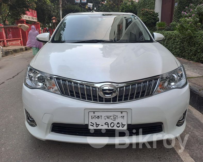 Toyota Axio WHITE PEARL COLOR 2014 for Sale in Uttara | Bikroy